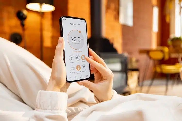 How can I manage my heating remotely with a smart thermostat?